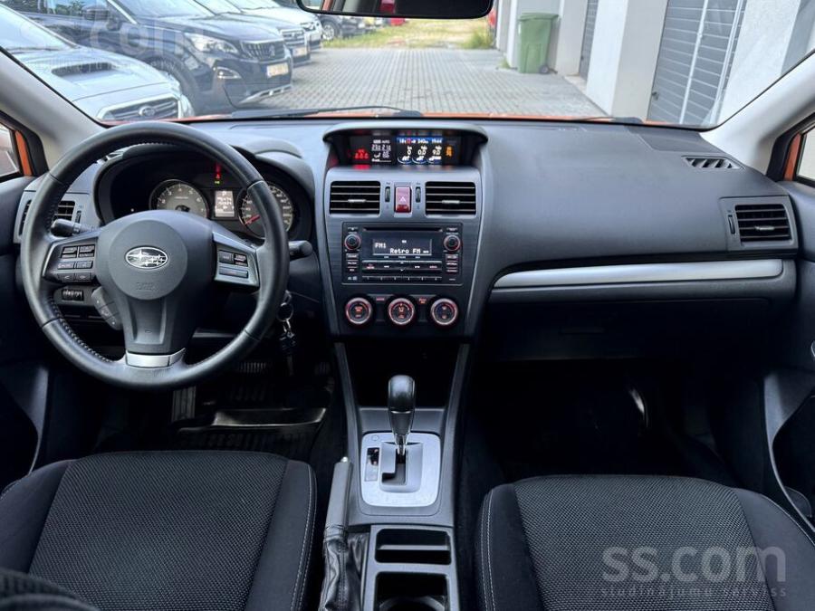 Orange Subaru XV 2013 in Riga, with an engine capacity of 1.60 L and mileage of 157 thousand km for 7700 €, photo 12 on AUTOMOTO.COM.LV