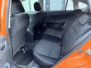 Orange Subaru XV 2013 in Riga, with an engine capacity of 1.60 L and mileage of 157 thousand km for 7700 €, photo 14 on AUTOMOTO.COM.LV