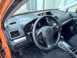 Orange Subaru XV 2013 in Riga, with an engine capacity of 1.60 L and mileage of 157 thousand km for 7700 €, photo 16 on AUTOMOTO.COM.LV