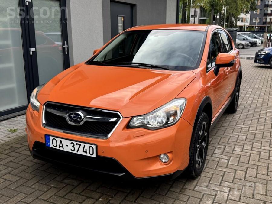 Orange Subaru XV 2013 in Riga, with an engine capacity of 2.00 L and mileage of 167 thousand km for 7700 €, photo 1 on AUTOMOTO.COM.LV