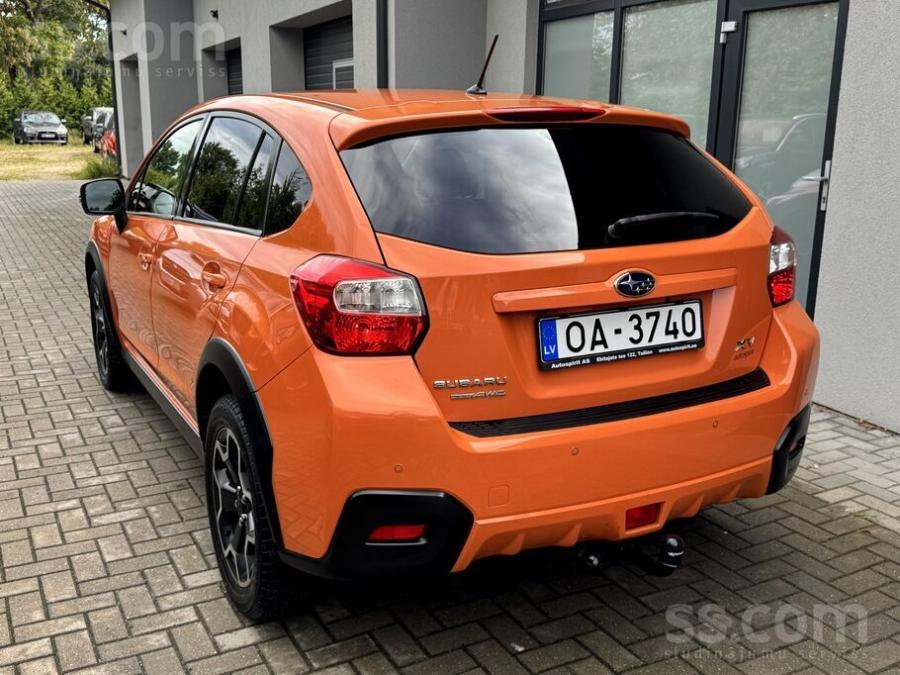 Orange Subaru XV 2013 in Riga, with an engine capacity of 2.00 L and mileage of 167 thousand km for 7700 €, photo 5 on AUTOMOTO.COM.LV