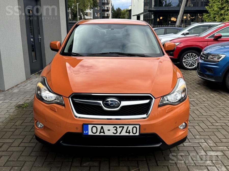 Orange Subaru XV 2013 in Riga, with an engine capacity of 2.00 L and mileage of 167 thousand km for 7700 €, photo 7 on AUTOMOTO.COM.LV