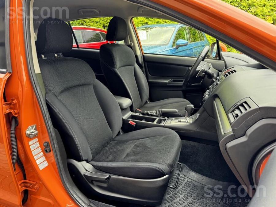 Orange Subaru XV 2013 in Riga, with an engine capacity of 2.00 L and mileage of 167 thousand km for 7700 €, photo 9 on AUTOMOTO.COM.LV