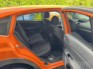 Orange Subaru XV 2013 in Riga, with an engine capacity of 2.00 L and mileage of 167 thousand km for 7700 €, photo 10 on AUTOMOTO.COM.LV