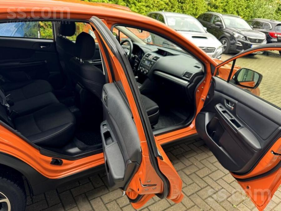 Orange Subaru XV 2013 in Riga, with an engine capacity of 2.00 L and mileage of 167 thousand km for 7700 €, photo 11 on AUTOMOTO.COM.LV