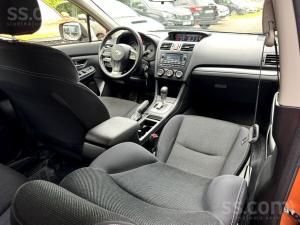 Orange Subaru XV 2013 in Riga, with an engine capacity of 2.00 L and mileage of 167 thousand km for 7700 €, photo 12 on AUTOMOTO.COM.LV