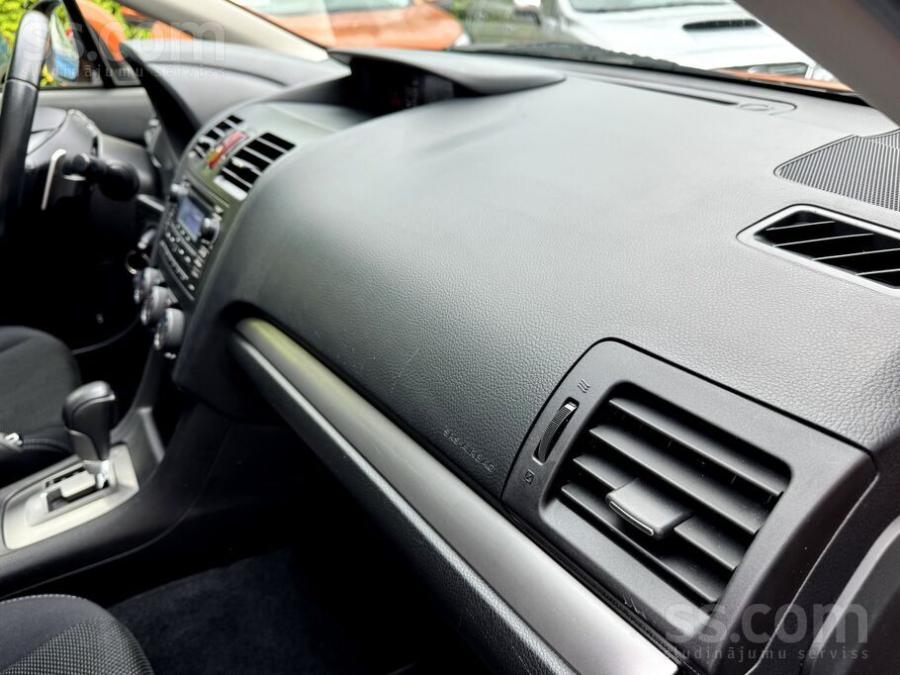 Orange Subaru XV 2013 in Riga, with an engine capacity of 2.00 L and mileage of 167 thousand km for 7700 €, photo 14 on AUTOMOTO.COM.LV