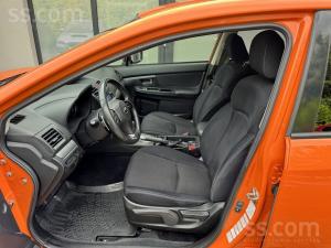 Orange Subaru XV 2013 in Riga, with an engine capacity of 2.00 L and mileage of 167 thousand km for 7700 €, photo 15 on AUTOMOTO.COM.LV