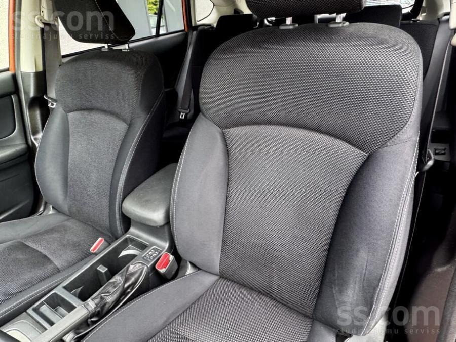 Orange Subaru XV 2013 in Riga, with an engine capacity of 2.00 L and mileage of 167 thousand km for 7700 €, photo 19 on AUTOMOTO.COM.LV