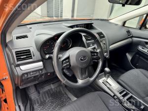 Orange Subaru XV 2013 in Riga, with an engine capacity of 2.00 L and mileage of 167 thousand km for 7700 €, photo 20 on AUTOMOTO.COM.LV