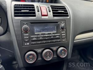 Orange Subaru XV 2013 in Riga, with an engine capacity of 2.00 L and mileage of 167 thousand km for 7700 €, photo 23 on AUTOMOTO.COM.LV