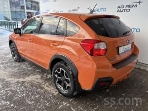 Orange Subaru XV 2012 in Riga, with an engine capacity of 2.00 L and mileage of 163 thousand km for 6500 €, photo 3 on AUTOMOTO.COM.LV