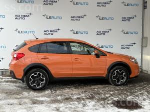 Orange Subaru XV 2012 in Riga, with an engine capacity of 2.00 L and mileage of 163 thousand km for 6500 €, photo 5 on AUTOMOTO.COM.LV