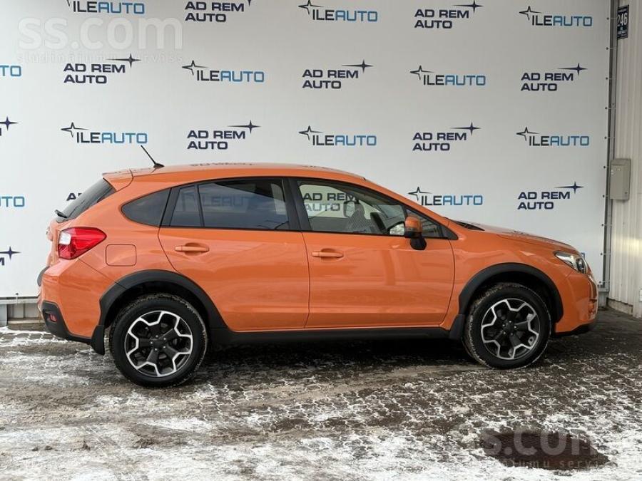 Orange Subaru XV 2012 in Riga, with an engine capacity of 2.00 L and mileage of 163 thousand km for 6500 €, photo 5 on AUTOMOTO.COM.LV