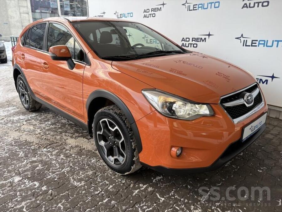 Orange Subaru XV 2012 in Riga, with an engine capacity of 2.00 L and mileage of 163 thousand km for 6500 €, photo 6 on AUTOMOTO.COM.LV