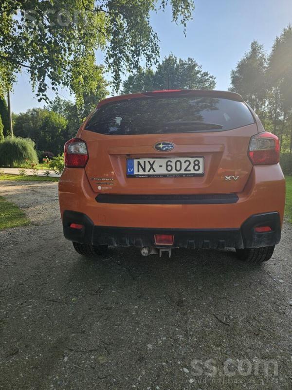 Oranžs Subaru XV 2014 Cēsis, ar dzinēja tilpumu 2.00 L un nobraukumu 185 tūkst. km par 7900 €, foto 4 vietnē AUTOMOTO.COM.LV