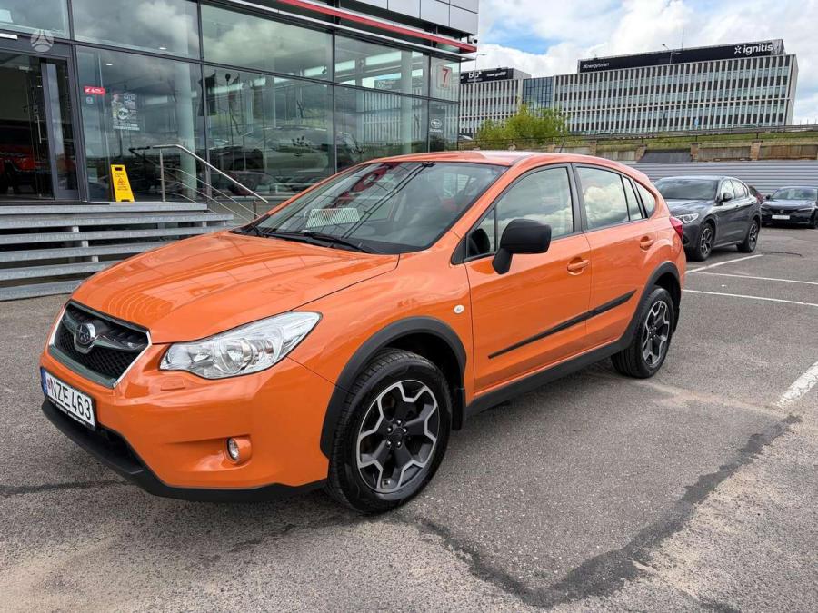 Orange Subaru XV 2014 in Vilnius, with an engine capacity of 2.00 L and mileage of 182 thousand km for 9290 €, photo 1 on AUTOMOTO.COM.LV