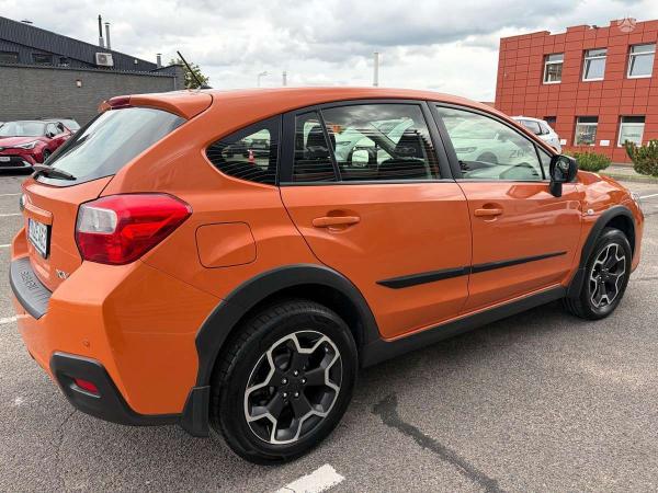 Orange Subaru XV 2014 in Vilnius, with an engine capacity of 2.00 L and mileage of 182 thousand km for 9290 €, photo 2 on AUTOMOTO.COM.LV