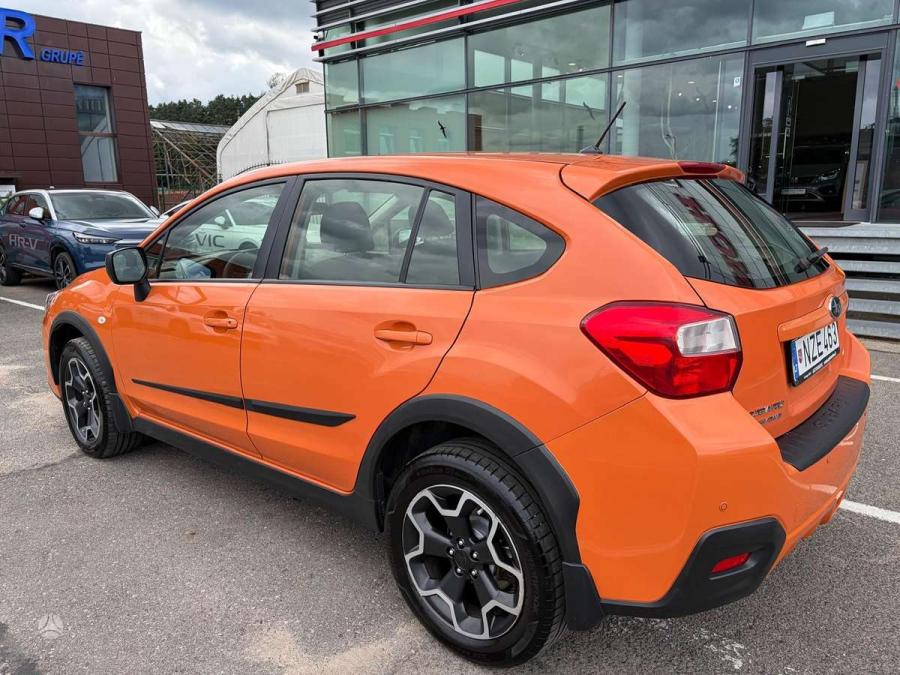 Orange Subaru XV 2014 in Vilnius, with an engine capacity of 2.00 L and mileage of 182 thousand km for 9290 €, photo 4 on AUTOMOTO.COM.LV
