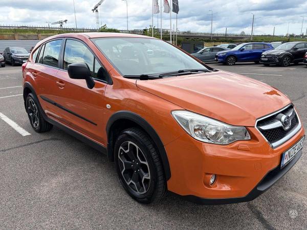 Orange Subaru XV 2014 in Vilnius, with an engine capacity of 2.00 L and mileage of 182 thousand km for 9290 €, photo 4 on AUTOMOTO.COM.LV