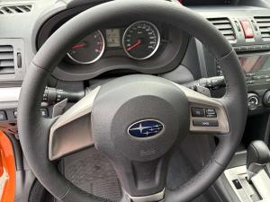 Orange Subaru XV 2014 in Vilnius, with an engine capacity of 2.00 L and mileage of 182 thousand km for 9290 €, photo 13 on AUTOMOTO.COM.LV