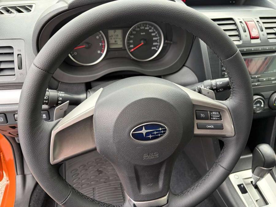 Orange Subaru XV 2014 in Vilnius, with an engine capacity of 2.00 L and mileage of 182 thousand km for 9290 €, photo 13 on AUTOMOTO.COM.LV