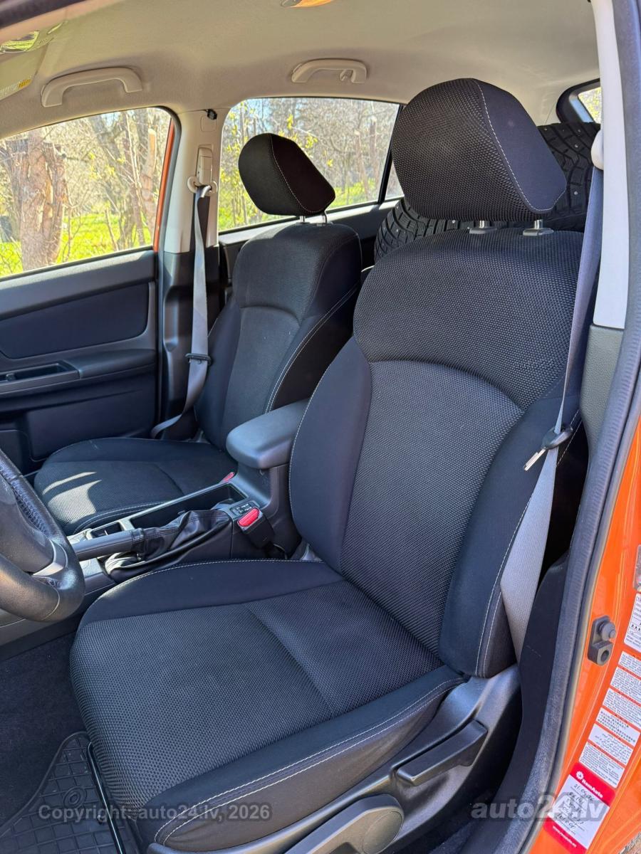 Orange Subaru XV 2012 in Tallinn, with an engine capacity of 2.00 L and mileage of 87 thousand km for 8990 €, photo 4 on AUTOMOTO.COM.LV