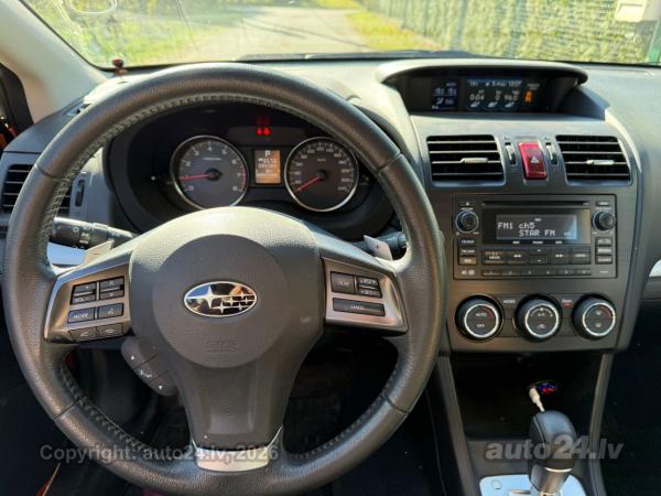 Orange Subaru XV 2012 in Tallinn, with an engine capacity of 2.00 L and mileage of 87 thousand km for 8990 €, photo 4 on AUTOMOTO.COM.LV