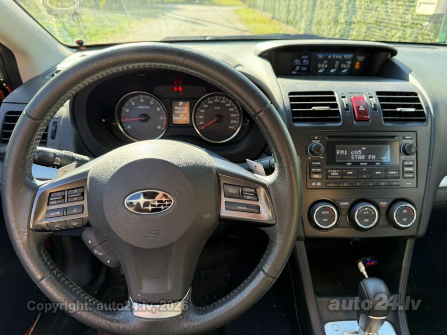 Orange Subaru XV 2012 in Tallinn, with an engine capacity of 2.00 L and mileage of 87 thousand km for 8990 €, photo 5 on AUTOMOTO.COM.LV