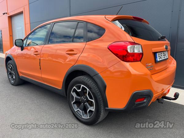 Oranžs Subaru XV 2012 Kuresāre, ar dzinēja tilpumu 2.00 L un nobraukumu 87 tūkst. km par 9990 €, foto 4 vietnē AUTOMOTO.COM.LV