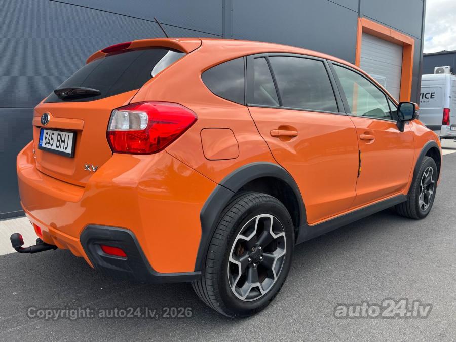 Oranžs Subaru XV 2012 Kuresāre, ar dzinēja tilpumu 2.00 L un nobraukumu 87 tūkst. km par 9990 €, foto 7 vietnē AUTOMOTO.COM.LV