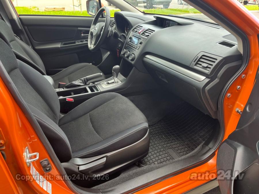Oranžs Subaru XV 2012 Kuresāre, ar dzinēja tilpumu 2.00 L un nobraukumu 87 tūkst. km par 9990 €, foto 14 vietnē AUTOMOTO.COM.LV