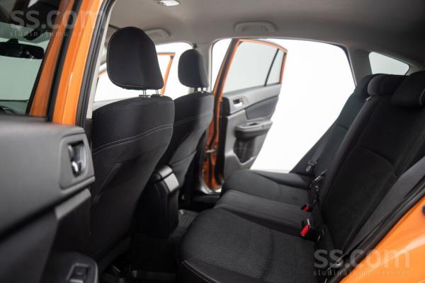 Orange Subaru XV 2012 in Riga, with an engine capacity of 1.60 L and mileage of 240 thousand km for 6999 €, photo 8 on AUTOMOTO.COM.LV