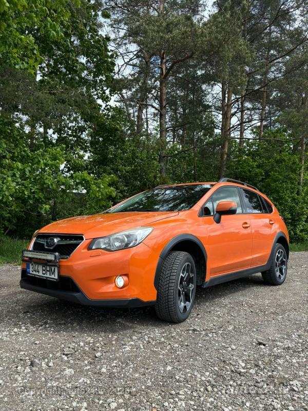 Orange Subaru XV 2012 in Tallinn, with an engine capacity of 2.00 L and mileage of 230 thousand km for 5800 €, photo 1 on AUTOMOTO.COM.LV