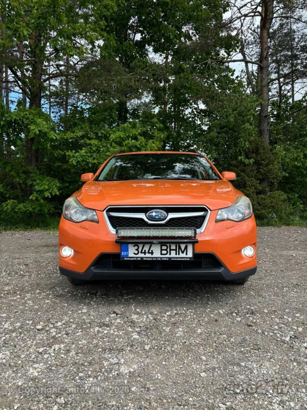 Orange Subaru XV 2012 in Tallinn, with an engine capacity of 2.00 L and mileage of 230 thousand km for 5800 €, photo 3 on AUTOMOTO.COM.LV
