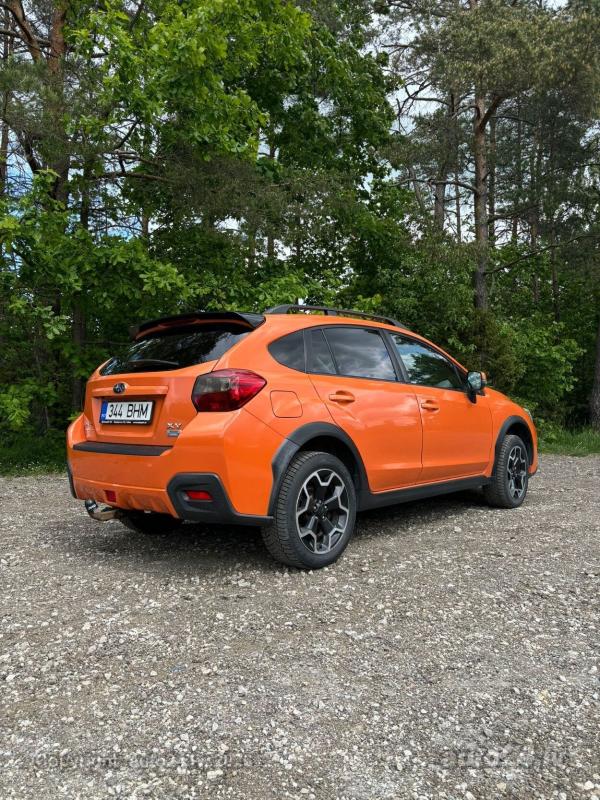 Orange Subaru XV 2012 in Tallinn, with an engine capacity of 2.00 L and mileage of 230 thousand km for 5800 €, photo 6 on AUTOMOTO.COM.LV