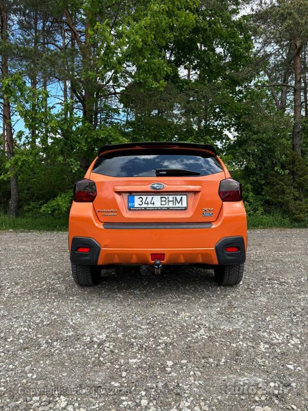 Orange Subaru XV 2012 in Tallinn, with an engine capacity of 2.00 L and mileage of 230 thousand km for 5800 €, photo 7 on AUTOMOTO.COM.LV