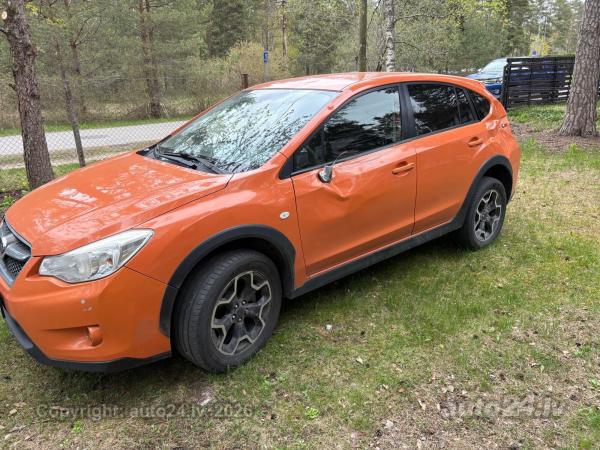 Orange Subaru XV 2013 in Tallinn, with an engine capacity of 1.60 L and mileage of 170 thousand km for 3950 €, photo 4 on AUTOMOTO.COM.LV