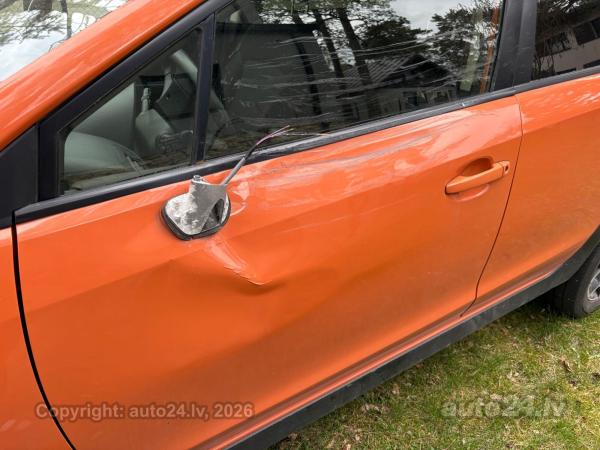 Orange Subaru XV 2013 in Tallinn, with an engine capacity of 1.60 L and mileage of 170 thousand km for 3950 €, photo 7 on AUTOMOTO.COM.LV