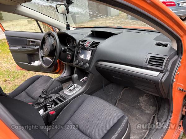 Orange Subaru XV 2013 in Tallinn, with an engine capacity of 1.60 L and mileage of 170 thousand km for 3950 €, photo 10 on AUTOMOTO.COM.LV