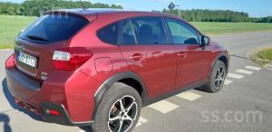 Red Subaru XV 2014 in Riga, with an engine capacity of 2.00 L and mileage of 142 thousand km for 6800 €, photo  on AUTOMOTO.COM.LV