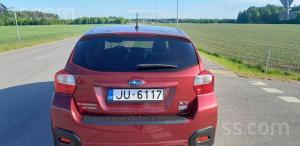 Red Subaru XV 2014 in Riga, with an engine capacity of 2.00 L and mileage of 142 thousand km for 6800 €, photo 3 on AUTOMOTO.COM.LV
