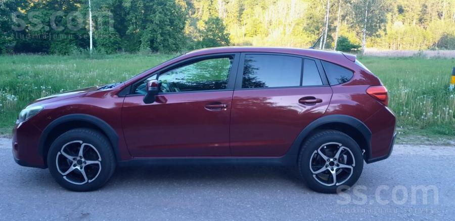 Red Subaru XV 2014 in Riga, with an engine capacity of 2.00 L and mileage of 142 thousand km for 6800 €, photo 4 on AUTOMOTO.COM.LV