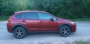 Red Subaru XV 2014 in Riga, with an engine capacity of 2.00 L and mileage of 142 thousand km for 6800 €, photo 5 on AUTOMOTO.COM.LV