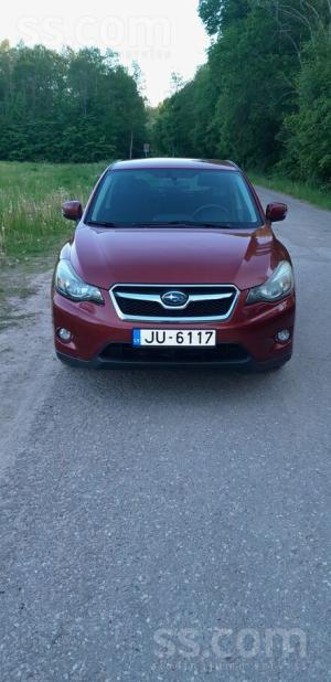 Red Subaru XV 2014 in Riga, with an engine capacity of 2.00 L and mileage of 142 thousand km for 6800 €, photo 6 on AUTOMOTO.COM.LV