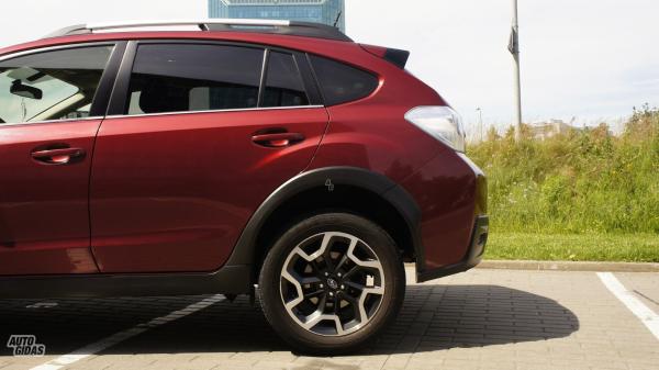 Red Subaru XV 2017 in Vilnius, with an engine capacity of 2.00 L and mileage of 113 thousand km for 14000 €, photo 5 on AUTOMOTO.COM.LV