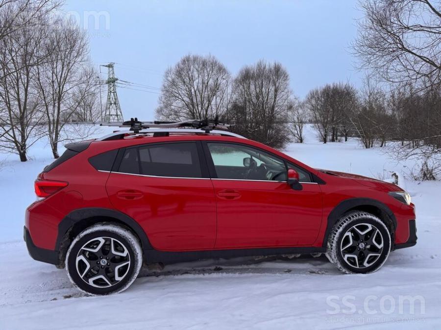 Red Subaru XV 2018 in Riga, with an engine capacity of 2.00 L and mileage of 163 thousand km for 15490 €, photo 1 on AUTOMOTO.COM.LV
