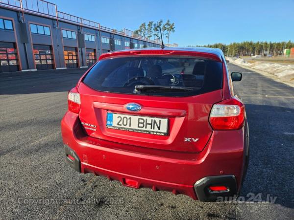 Red Subaru XV 2012 in Tallinn, with an engine capacity of 2.00 L and mileage of 119 thousand km for 8250 €, photo 4 on AUTOMOTO.COM.LV