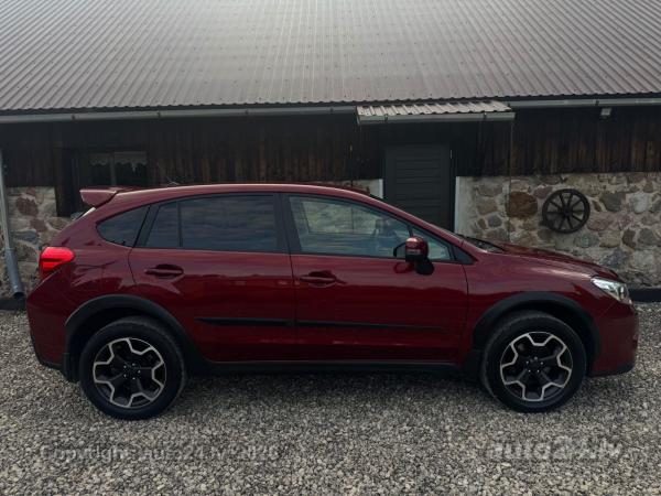 Red Subaru XV 2012 in Tallinn, with an engine capacity of 2.00 L and mileage of 89 thousand km for 10999 €, photo 2 on AUTOMOTO.COM.LV