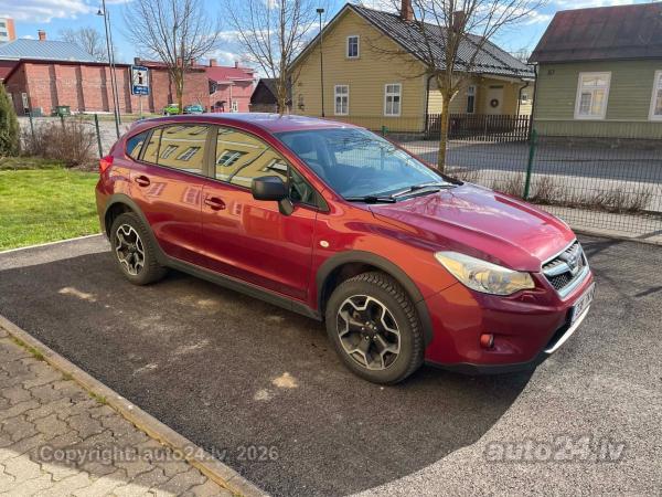 Red Subaru XV 2013 in Tallinn, with an engine capacity of 2.00 L and mileage of 105 thousand km for 8999 €, photo 1 on AUTOMOTO.COM.LV